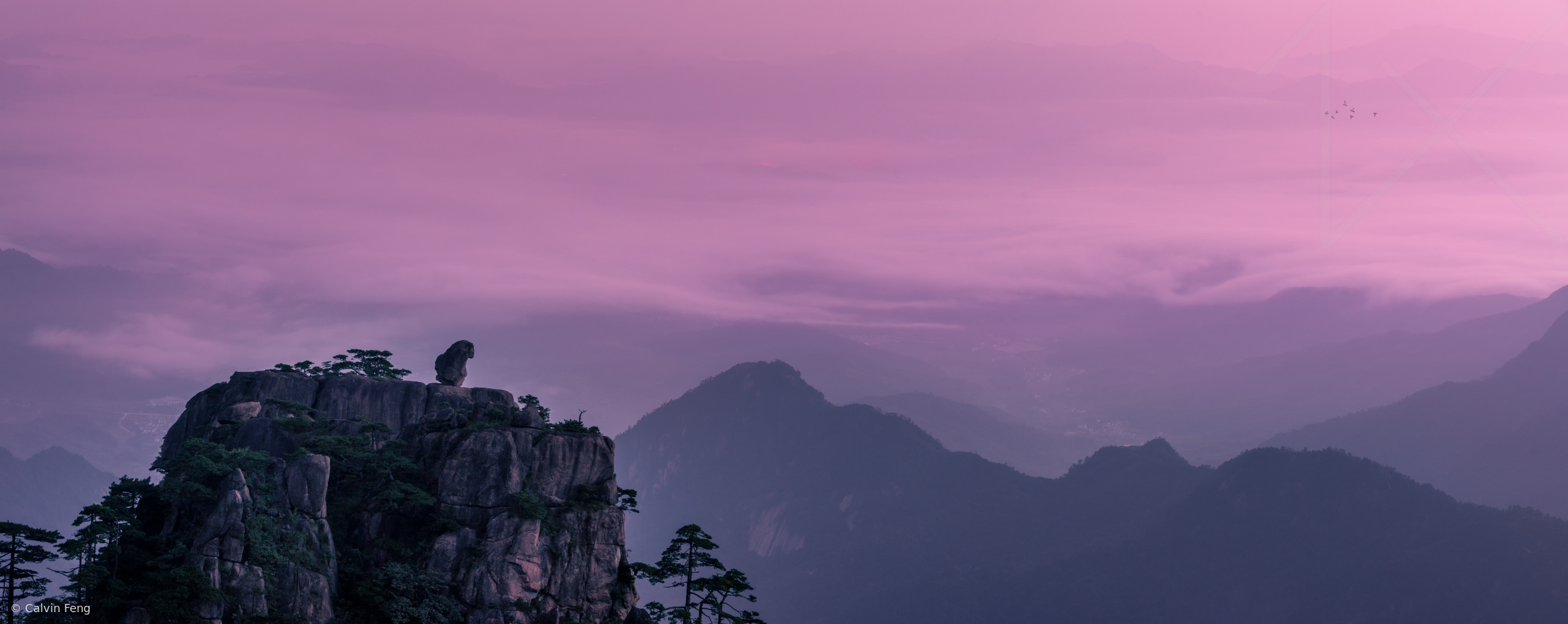 The rock monkey watching the sea cloud by Calvin Feng