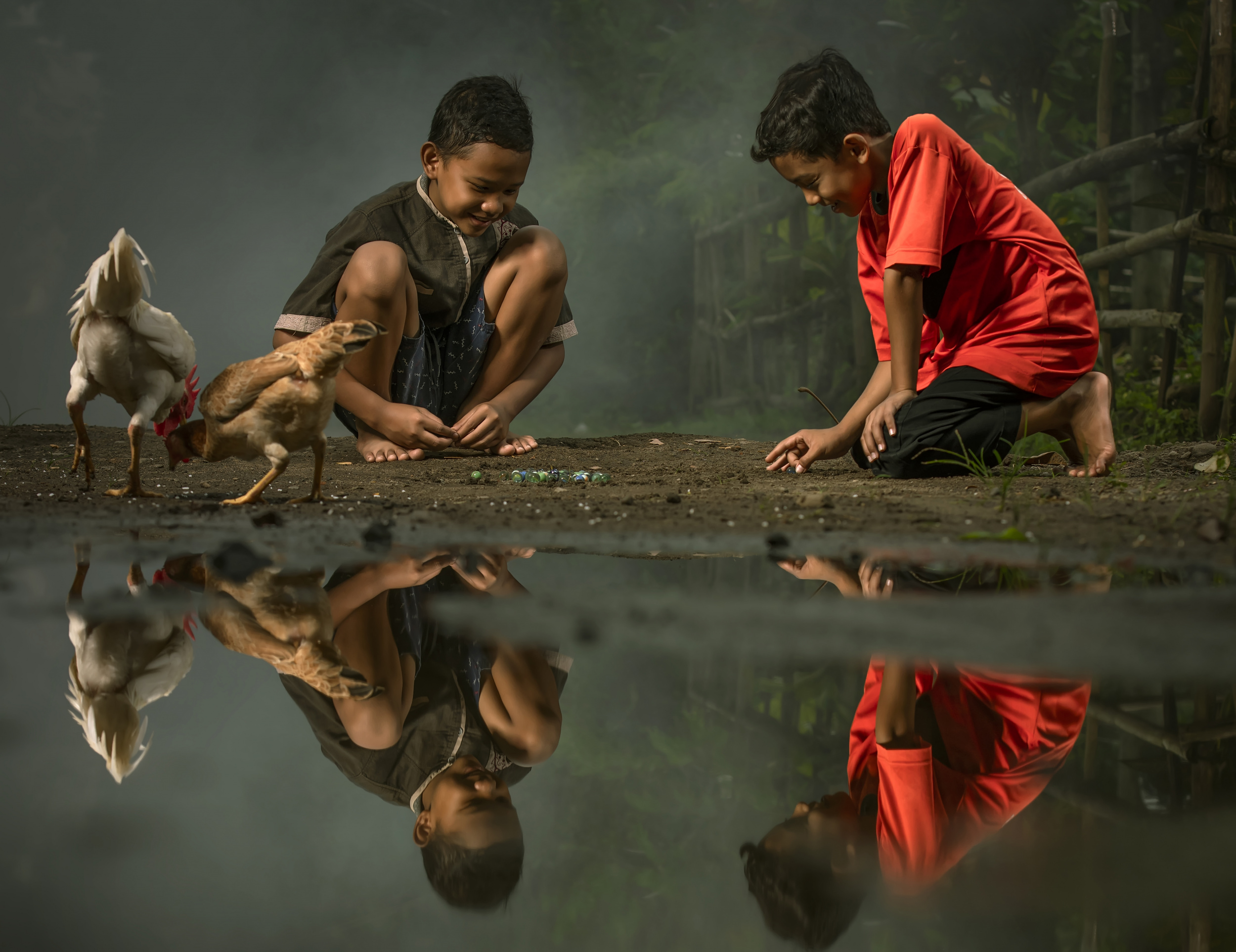 playing marbles by Andika Oky Arisandi